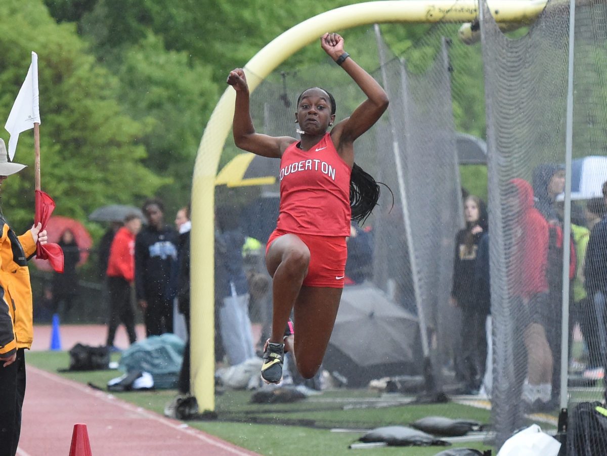 TRACK & FIELD: Destini Smith from Souderton wins the long jump event ...